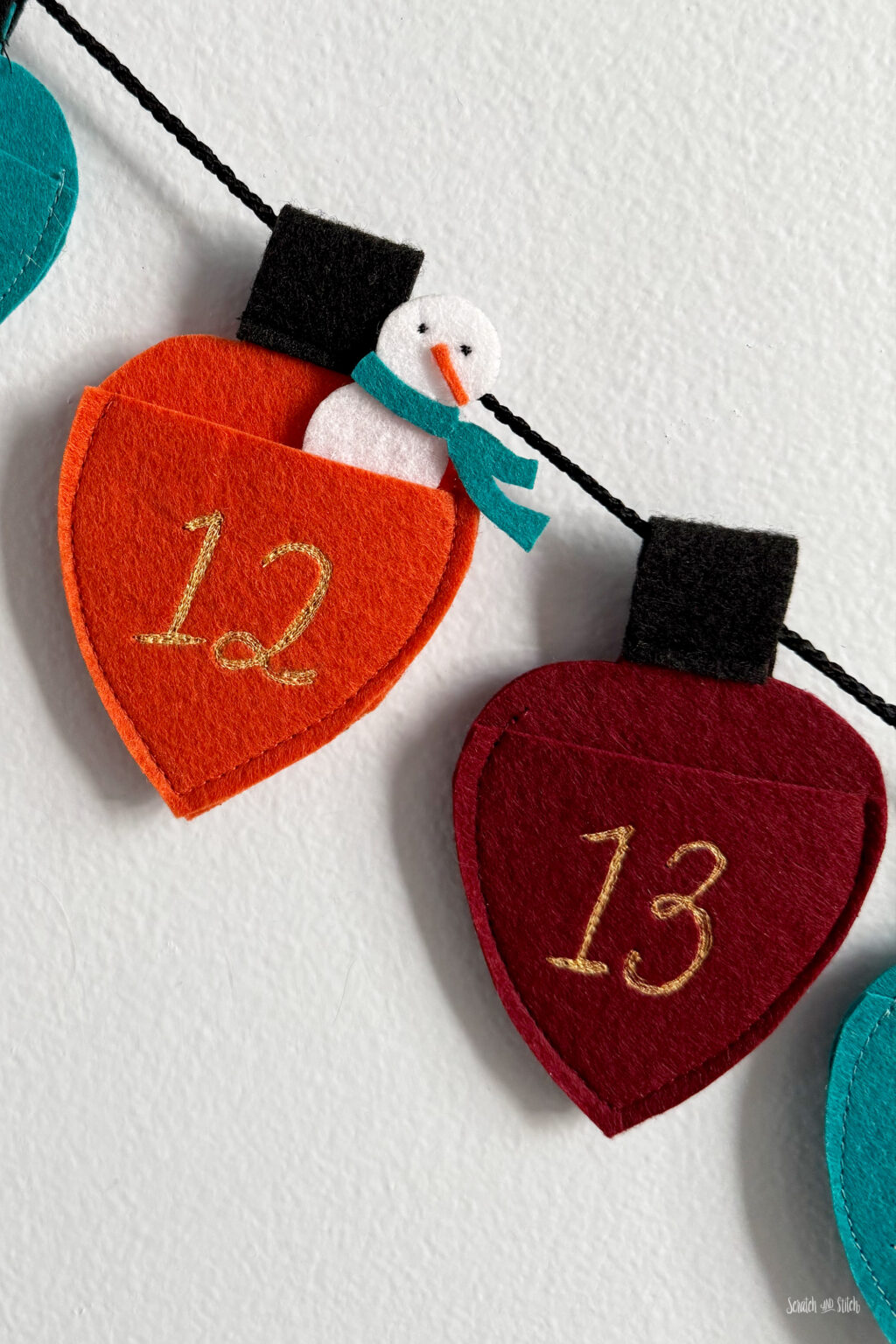 diy-felt-advent-calendar-scratchandstitch | Scratch and Stitch